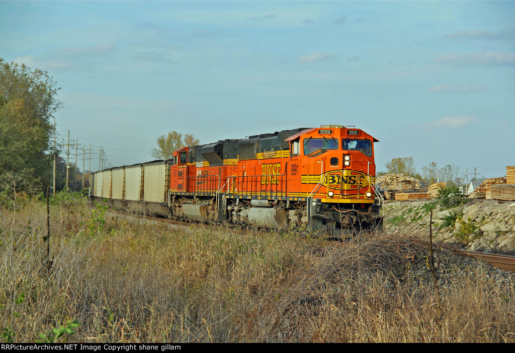 BNSF 9991 Leads a loaded coal Sb.